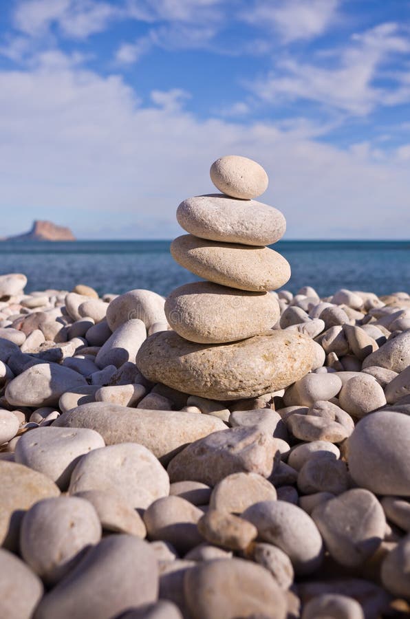 Balanced Pebbles on Beach stock photo. Image of horizon - 23576120