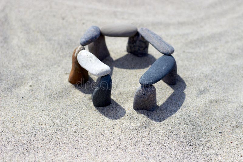 Balanced Pebbles on the Sandy Coast. Stones are Stacked on the Beach ...