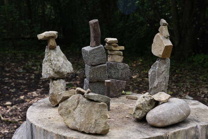 Balanced Pyramids of Natural Stones on an Old Tree Stump Stock Image ...
