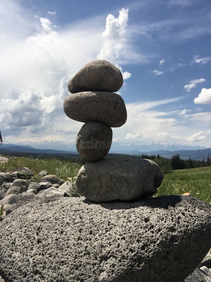 Rock Tower on a Natural Rock Formation Against an Ocean Background and ...
