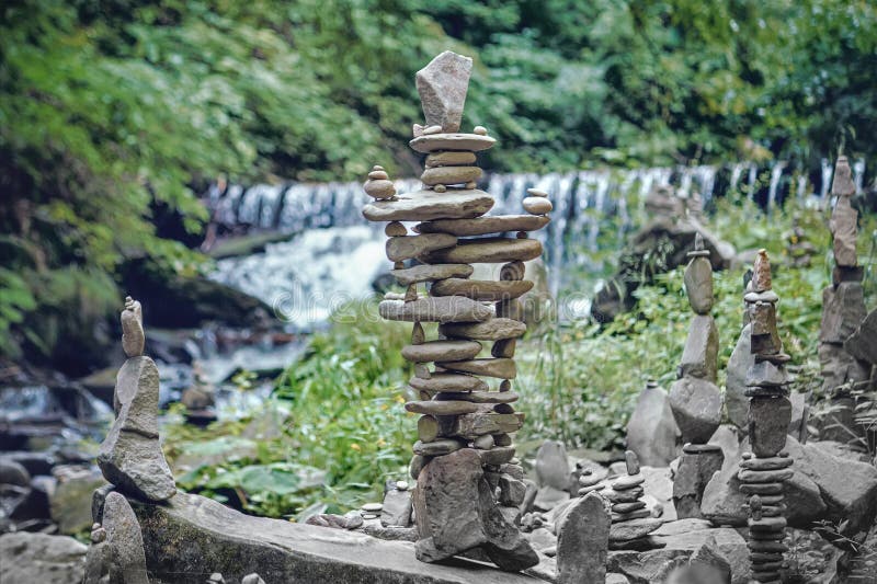 Balanced Rock Zen Stack in Front of Waterfall Stock Image - Image of ...