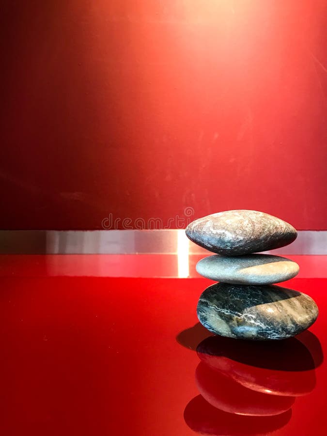Balanced Spa Stones on a Red Color Background Stock Photo - Image of ...