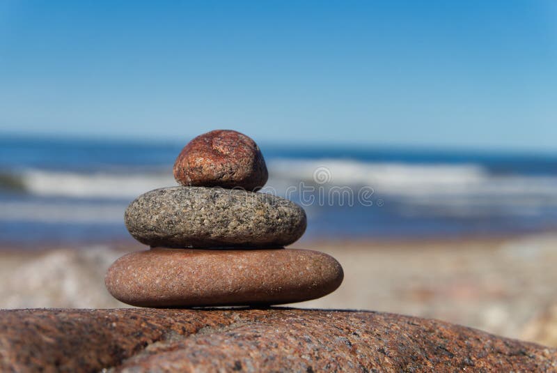 Balanced Stack of Stones or Rocks on a Beach Stock Image - Image of ...