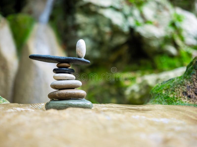Balanced Zen Stones at the Waterfalls Stock Image - Image of green ...