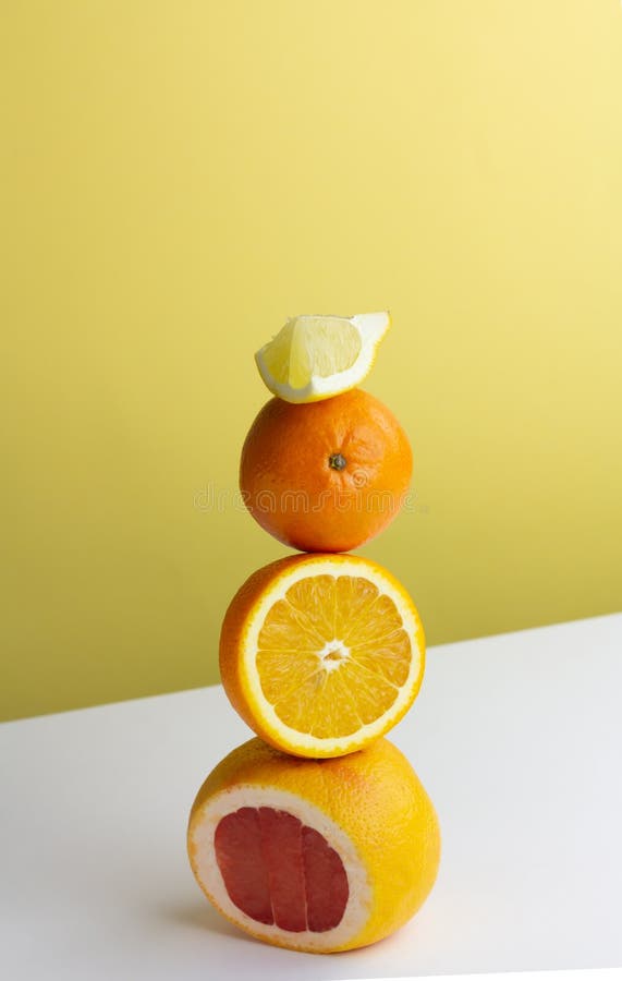 Balancing Fruit, Creative Concept. Pile of Colorfull Citrus Stock Photo ...
