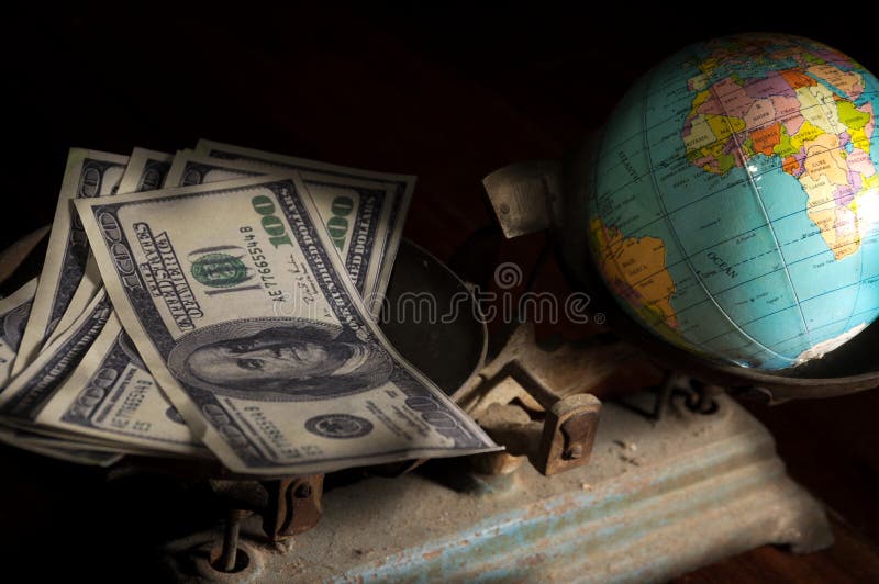 Balancing with Money and Earth. Stock Photo - Image of concept, money ...