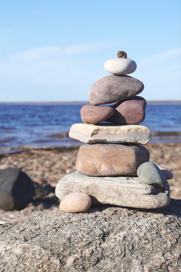 Balancing Rocks Forming a Cairn on a Beach with a Snail on Top Stock ...
