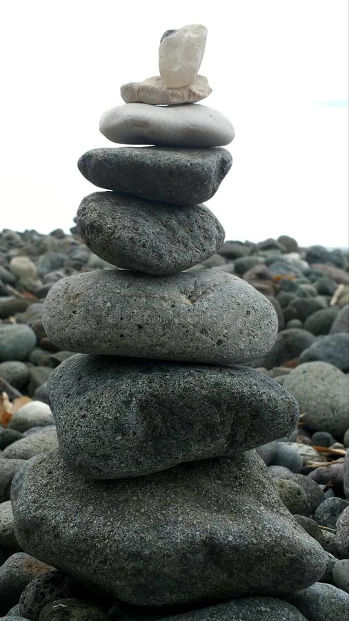 Balancing Stones in the Beach Stock Image - Image of rock, sand: 261746253