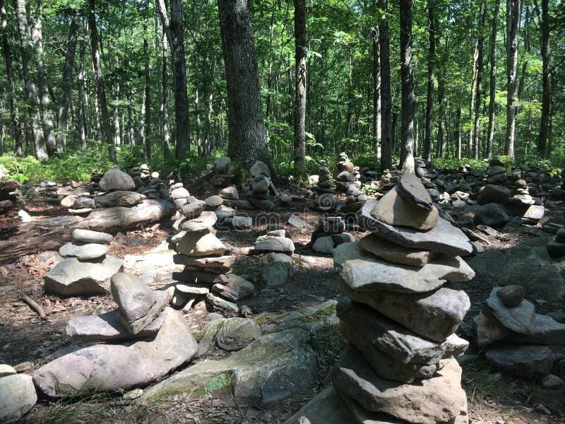 Balancing Stones in the Green Forest Stock Image - Image of serenity ...