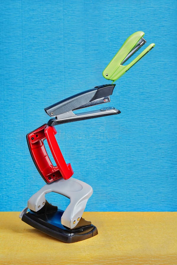 Balancing Tower of Staplers and Hole Punchers in Low Gravity. Stock ...