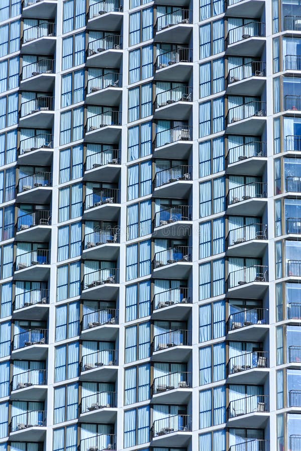 Many Balconies on Curved Glass Hotel Stock Photo - Image of window ...