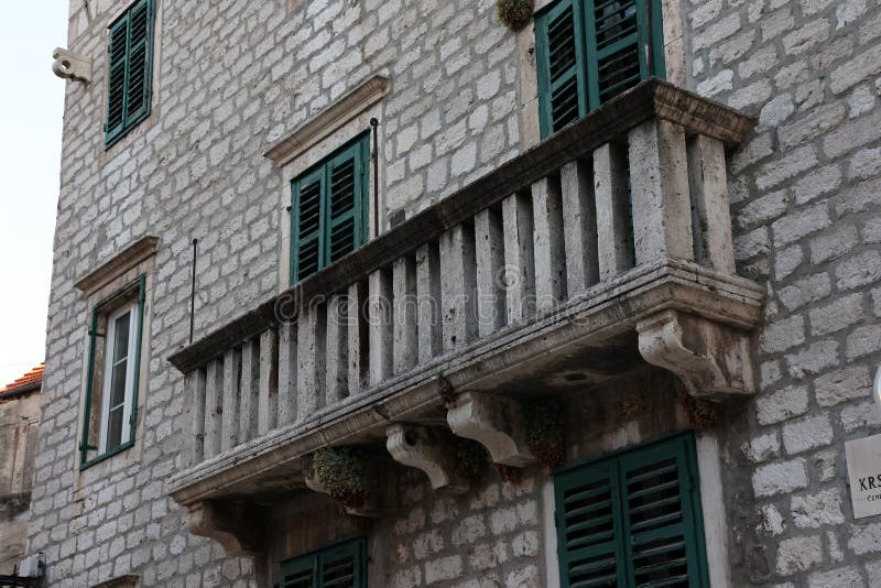 Balconies on Old Stone Buildings in Croatia Stock Photo - Image of ...