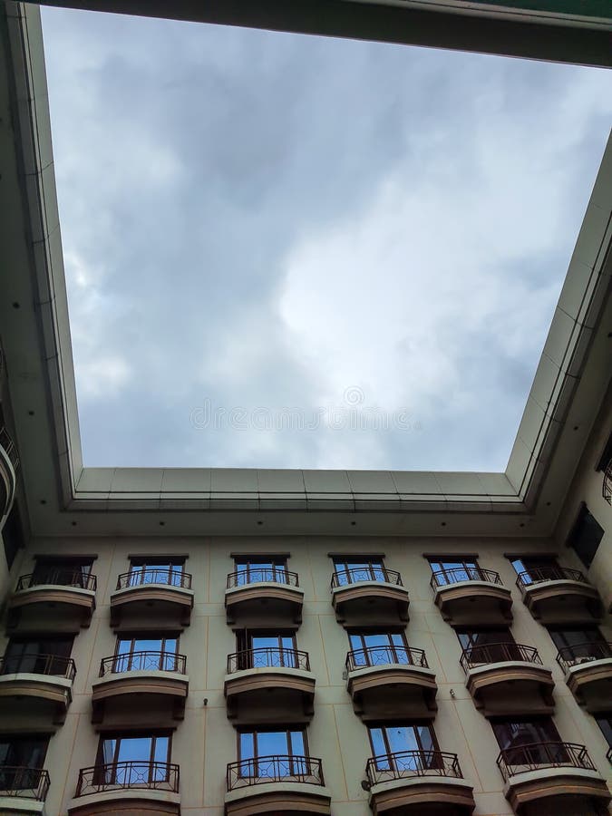 Balconies and Windows of Hotel Rooms Stock Photo - Image of blue, city ...