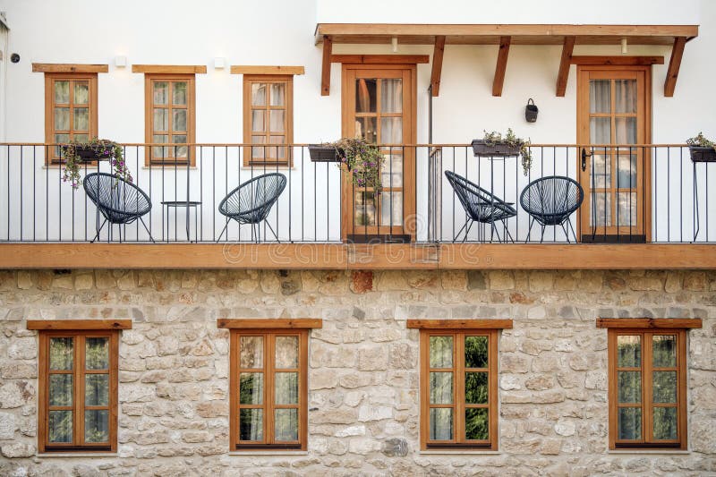 Balconies and Windows in a Row on the Facade of an Urban Apartment ...