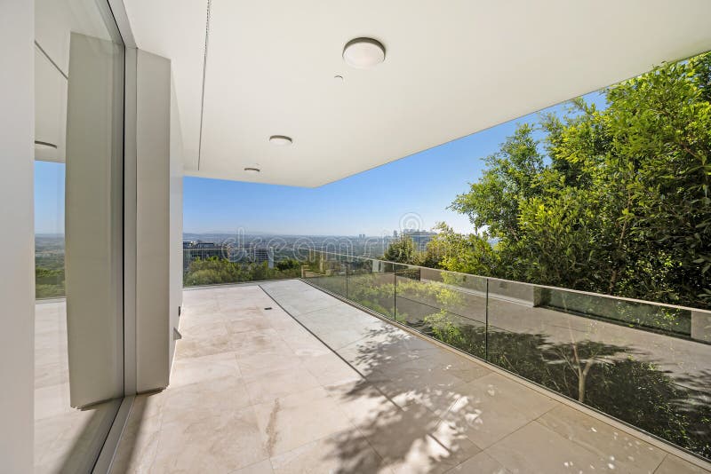 Balcony with a Glass Window and a Scenic View Stock Image - Image of ...