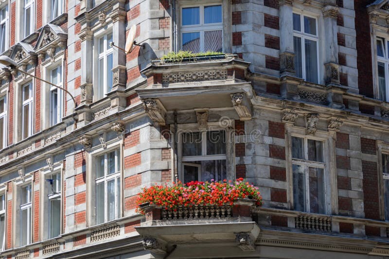 Balcony in an Old Building with Blooming Pelargoniums Stock Photo ...