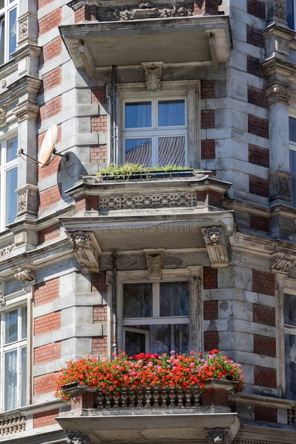 Balcony in an Old Building with Blooming Pelargoniums Stock Image ...