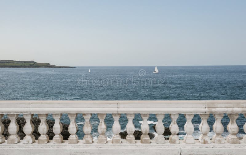 Balcony Overlooking The Yard Houses And Blue Sky With Clouds On A Sunny ...