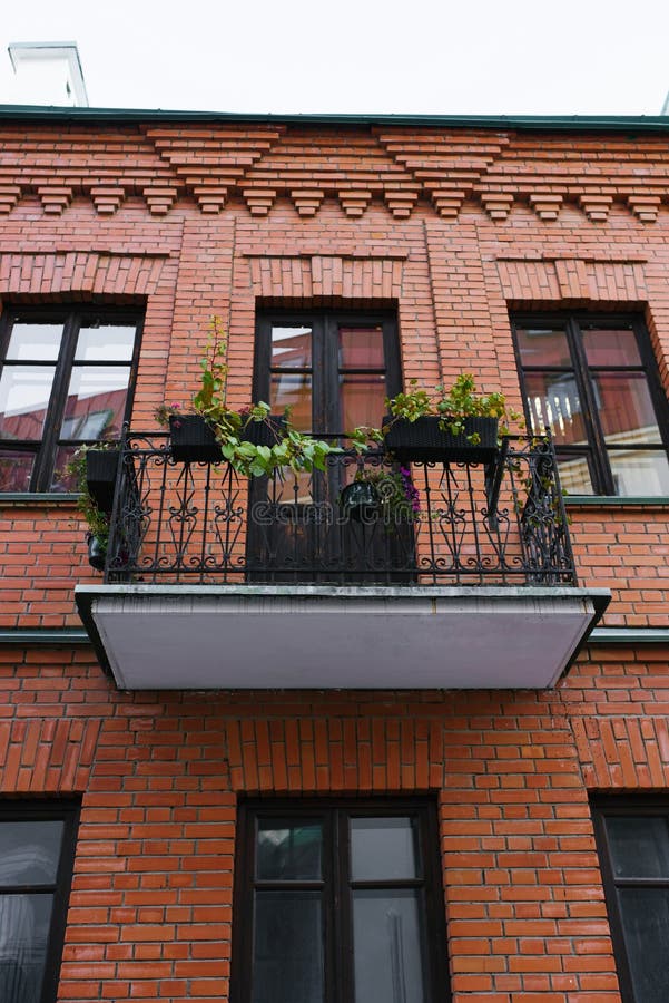 Balcony in a Red Brick House Stock Photo - Image of brick, balcony ...