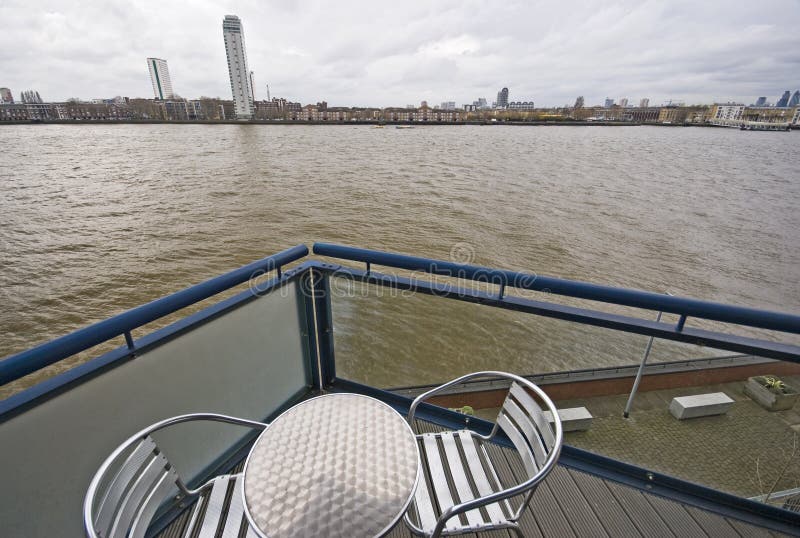 Balcony with river views stock photo. Image of clouds - 13676110