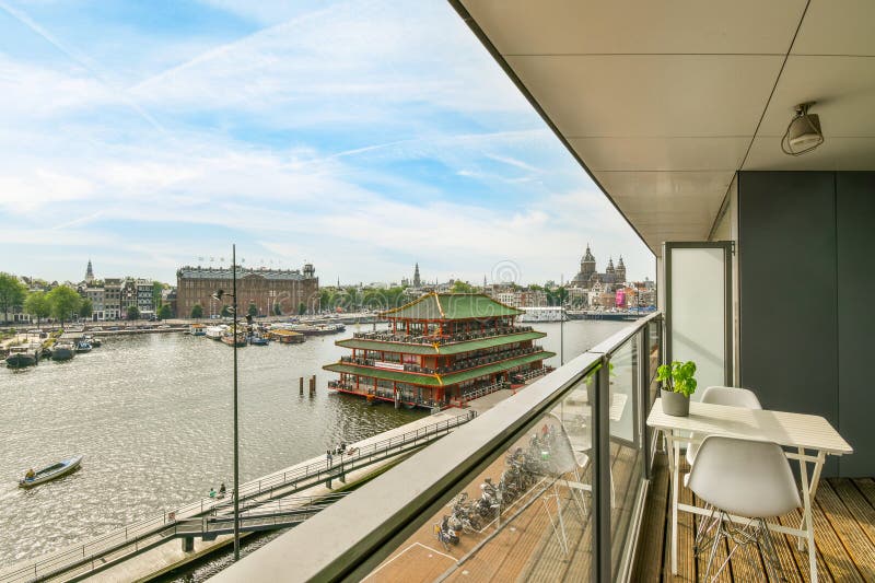 A Balcony with Views of a River and a Building Editorial Stock Photo ...