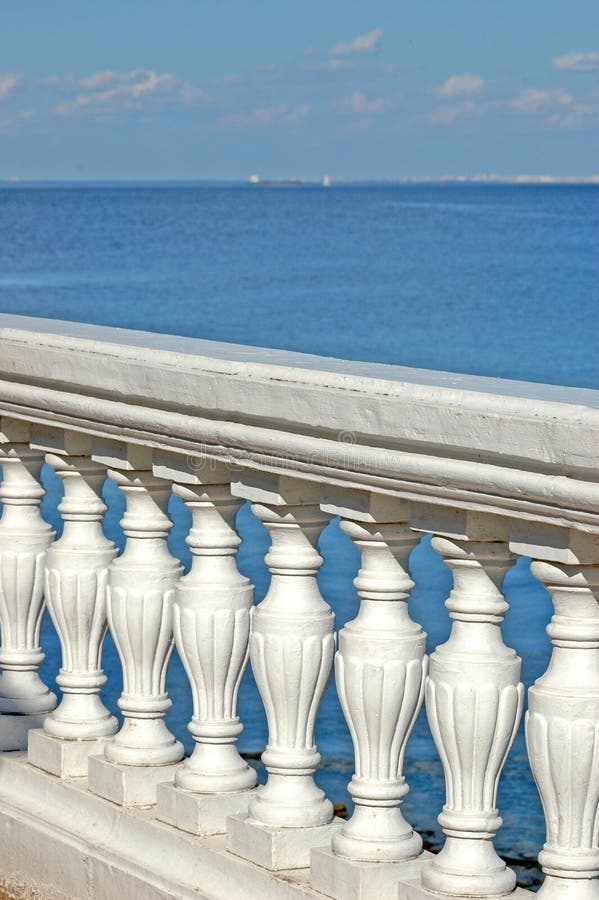 Balcony with White Railing on the Background of the Sea Stock Photo ...