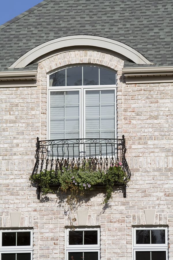 Balcony Window stock image. Image of upscale, brick, shingles - 1780281
