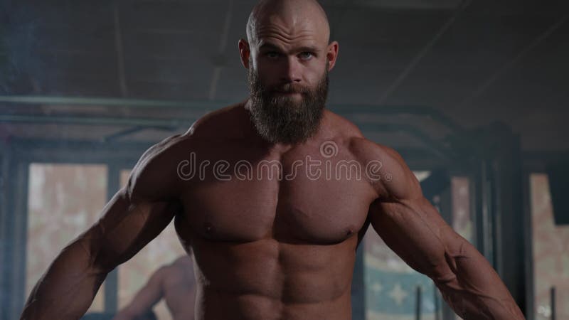 Bald Caucasian Bodybuilder Training Chest Using Cable Crossover in Gym ...