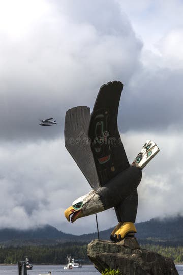 Bald Eagle Statue in Ketchikan with Float Plane in Sky Stock Photo ...