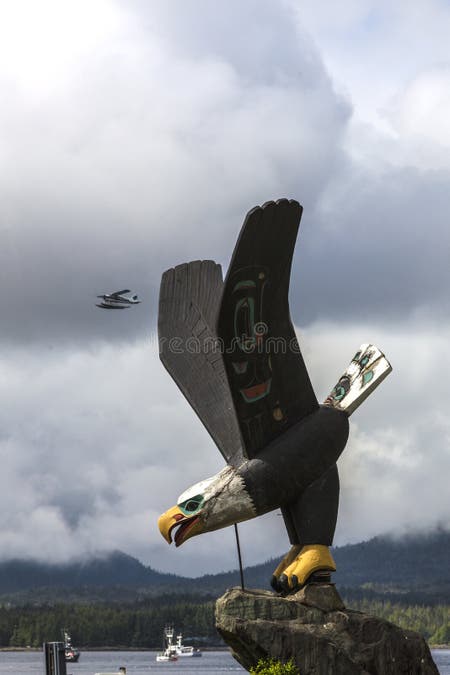 Bald Eagle Statue in Ketchikan with Float Plane in Sky Stock Photo ...