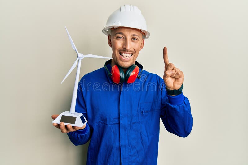 Bald Engineer Man with Beard Holding Photovoltaic Solar Panel Smiling ...