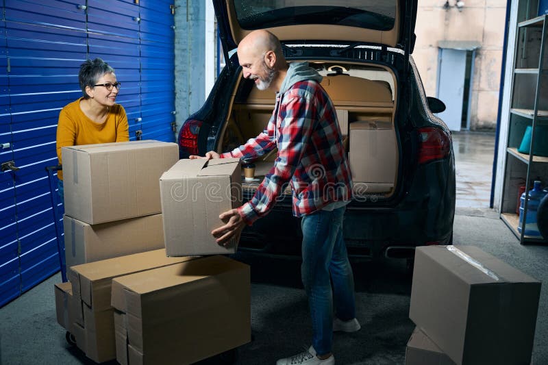 228 Woman Loading Car Boxes Stock Photos - Free & Royalty-Free Stock ...