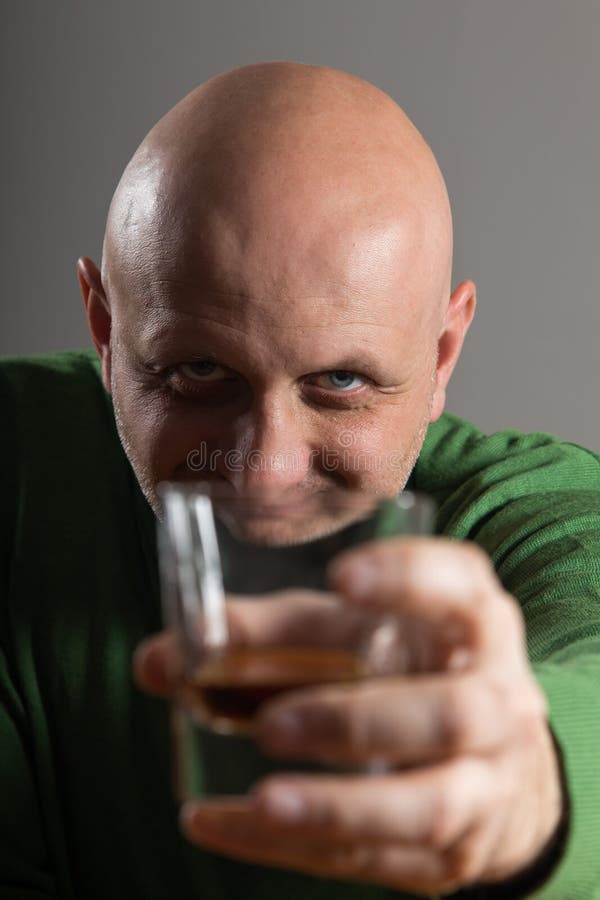 Bald Headed Man Drinking Whiskey Stock Photo - Image of closeup ...