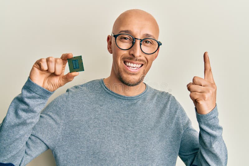 Bald Man with Beard Holding Cpu Computer Processor Smiling with an Idea ...