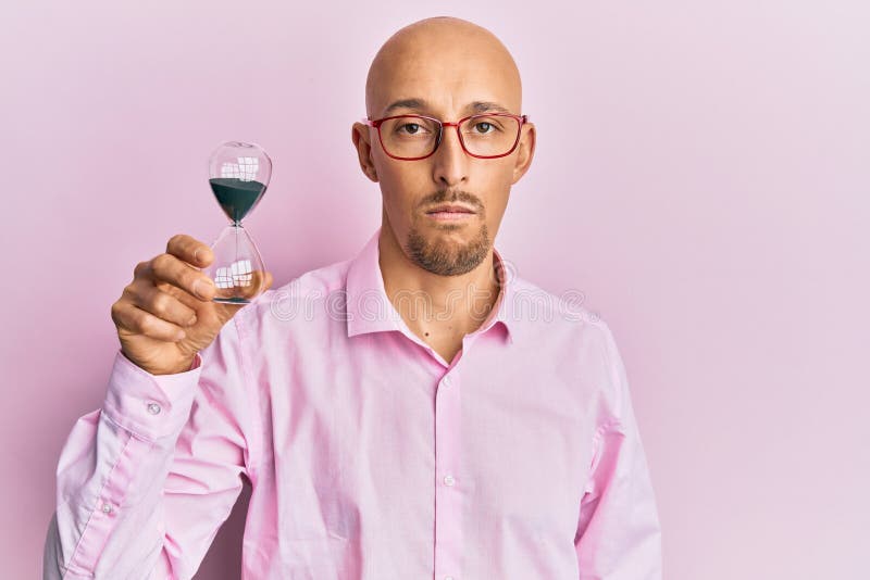 Bald Man with Beard Holding Sand Clock Thinking Attitude and Sober ...