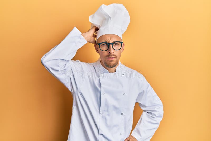 Bald Man with Beard Wearing Professional Cook Uniform Confuse and ...