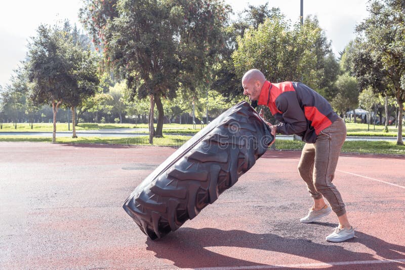 Fat Man Pushing Wheelbarrow Stock Photos - Free & Royalty-Free Stock ...
