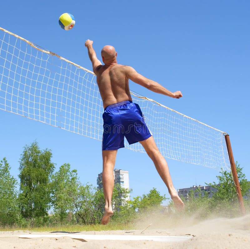 Bald man plays volleyball stock image. Image of male, play - 2700299