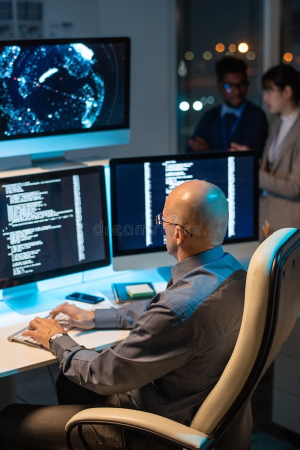 Bald Mature Businessman Decoding Data on Computer Screen Stock Image ...