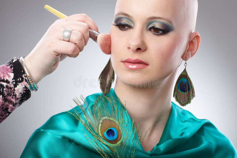 Bald woman getting makeup stock image. Image of single - 28598755
