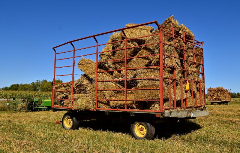 Bales in a caged hay rack editorial stock image. Image of load - 99782504