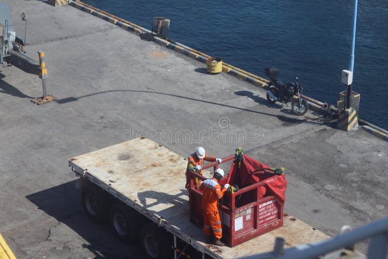 Banyuwangi, May 2022. Several Stevedores are Assisting the Process of ...