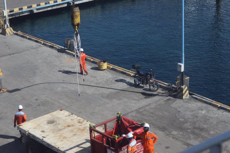 Banyuwangi, May 2022. Several Stevedores are Assisting the Process of ...