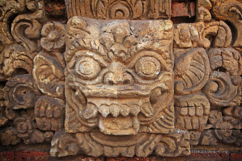 Bali Sculpture in Stone Wall. Stock Image - Image of flower, ancient ...