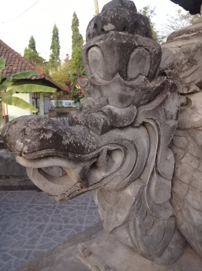 Balinese Statue Art in Tample Dragon with Crown Stock Image - Image of ...