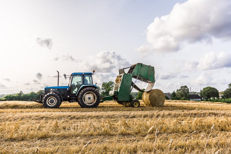 Baling Press Machine Farming in a Field Editorial Stock Photo - Image ...