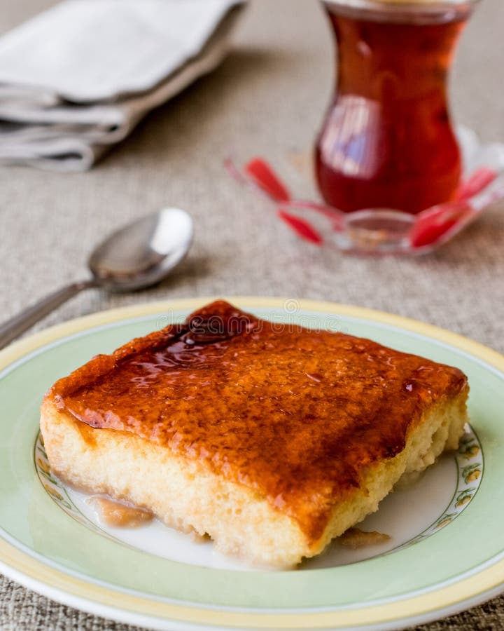 Balkan Dessert Cake Trilece with Caramel Sauce and Tea. Stock Photo ...