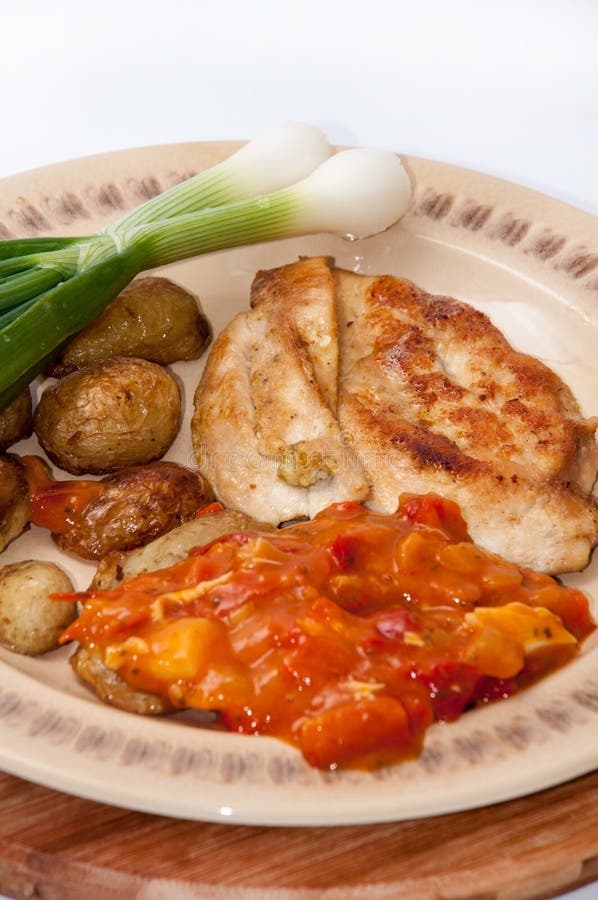 Balkan Tomato Stew with Fried Chicken and Pork Meat Stock Photo - Image ...