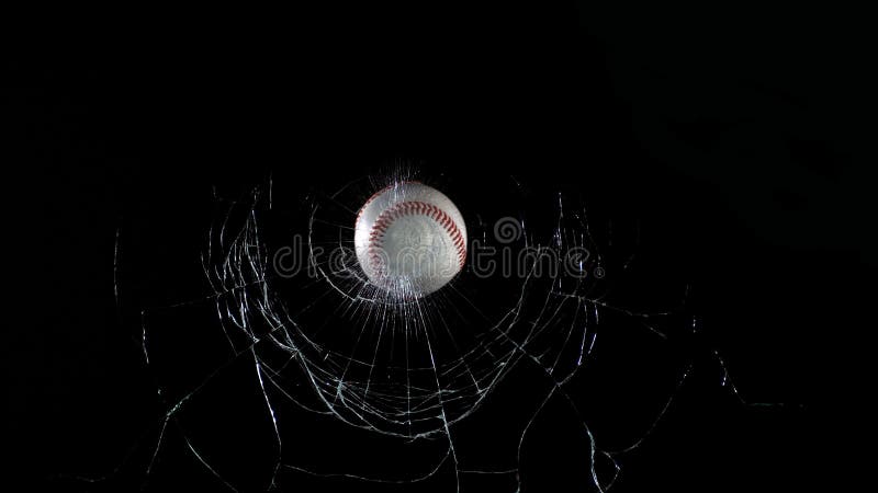 Ball of Baseball Breaking Pane of Glass Against Black Background Stock ...