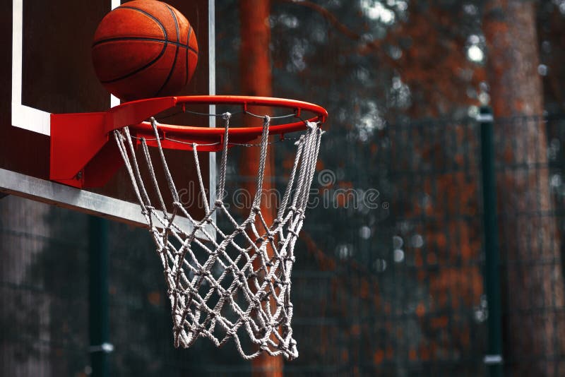 The Ball in the Basketball Hoop. Stock Photo - Image of netting, play ...